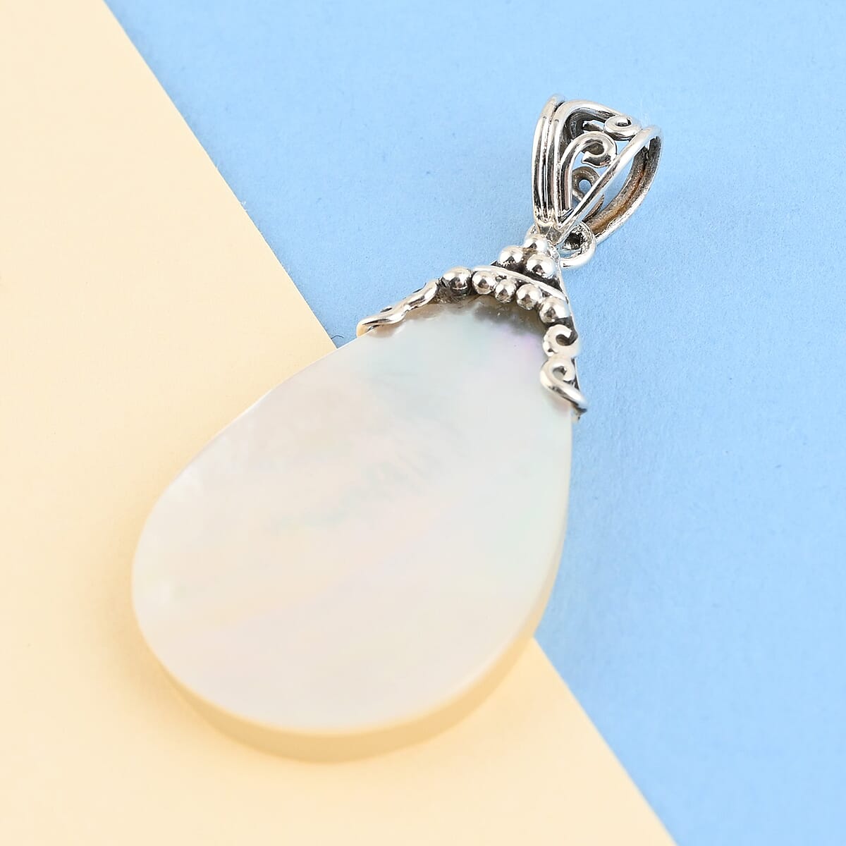 Buy Mother Of Pearl Pear Shape Pendant in Sterling Silver at ShopLC.